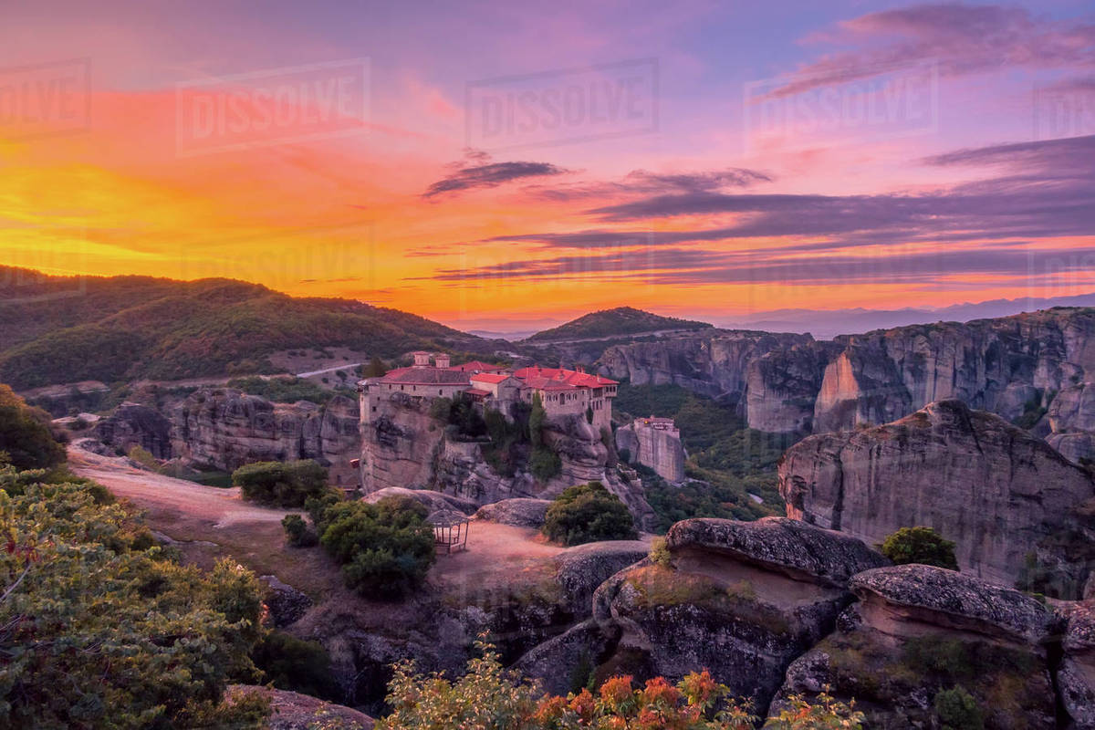 Greece. Summer dawn over a Greek rock monastery in Meteora (near ...