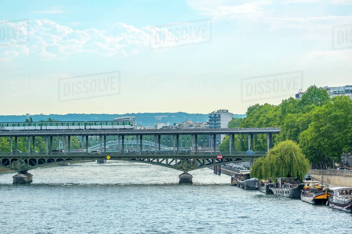 France. Summer day in Paris. Two-level Bir-Hakeim bridge over the Seine ...