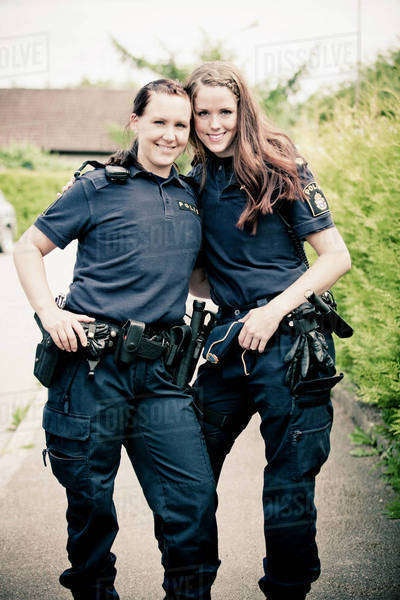 Portrait of two female police officers standing together - Stock Photo ...