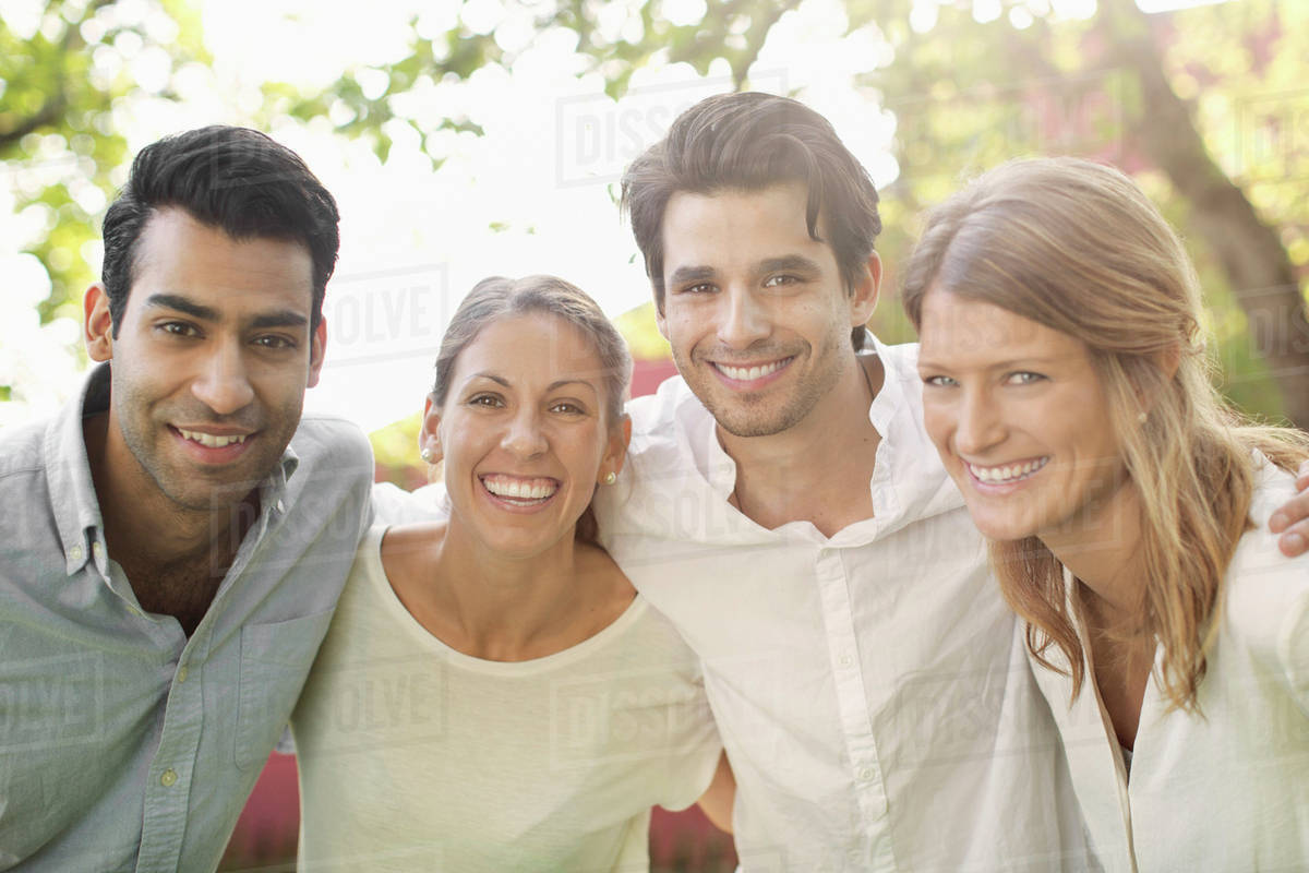 Portrait of four happy people outdoors - Royalty-free Stock Photo ...