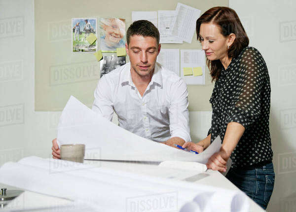 Two people look at - Royalty-free Stock Photo | Dissolve