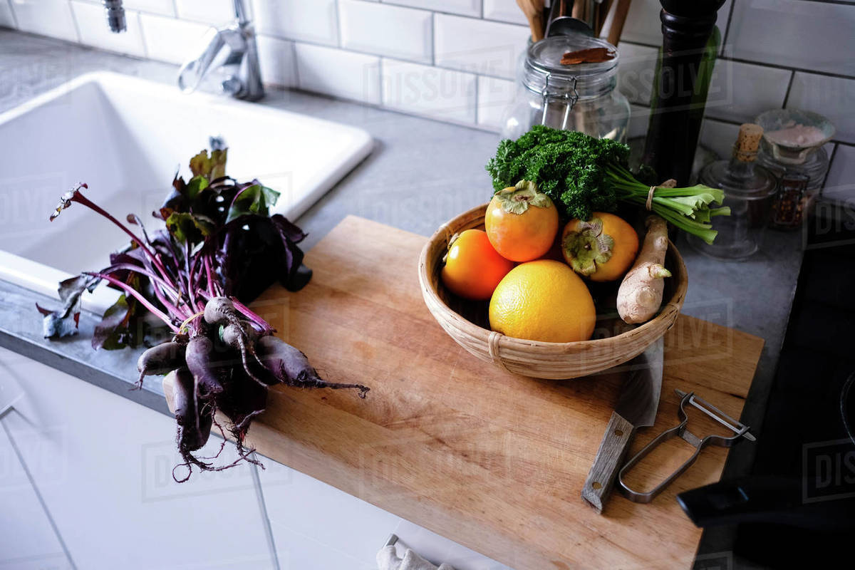 High angle view of fruits and vegetables on kitchen counter - Stock ...