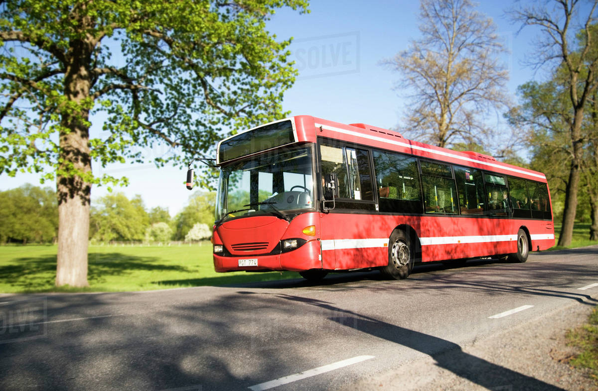Bus standing by the verge - Stock Photo - Dissolve
