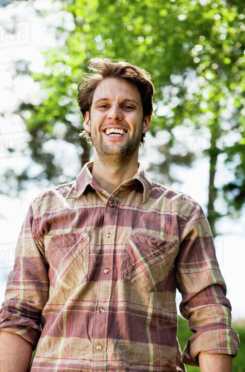 Happy man with shirt - Royalty-free Stock Photo | Dissolve