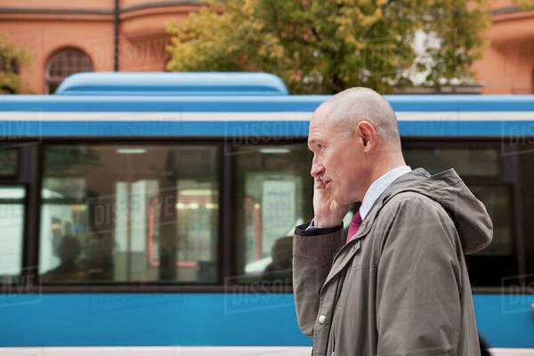 Man waiting on bus - Royalty-free Stock Photo | Dissolve