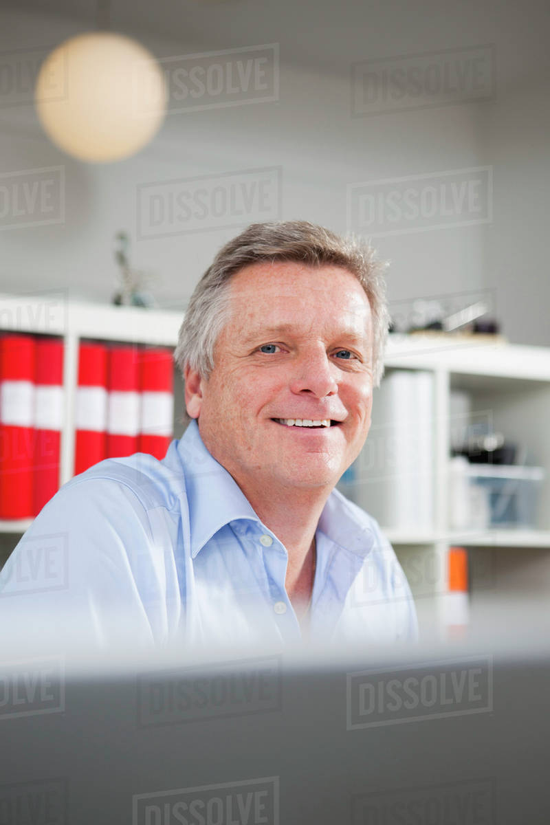 Happy man at work - Royalty-free Stock Photo | Dissolve