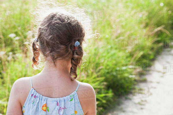 Girl seen from behind - Stock Photo - Dissolve