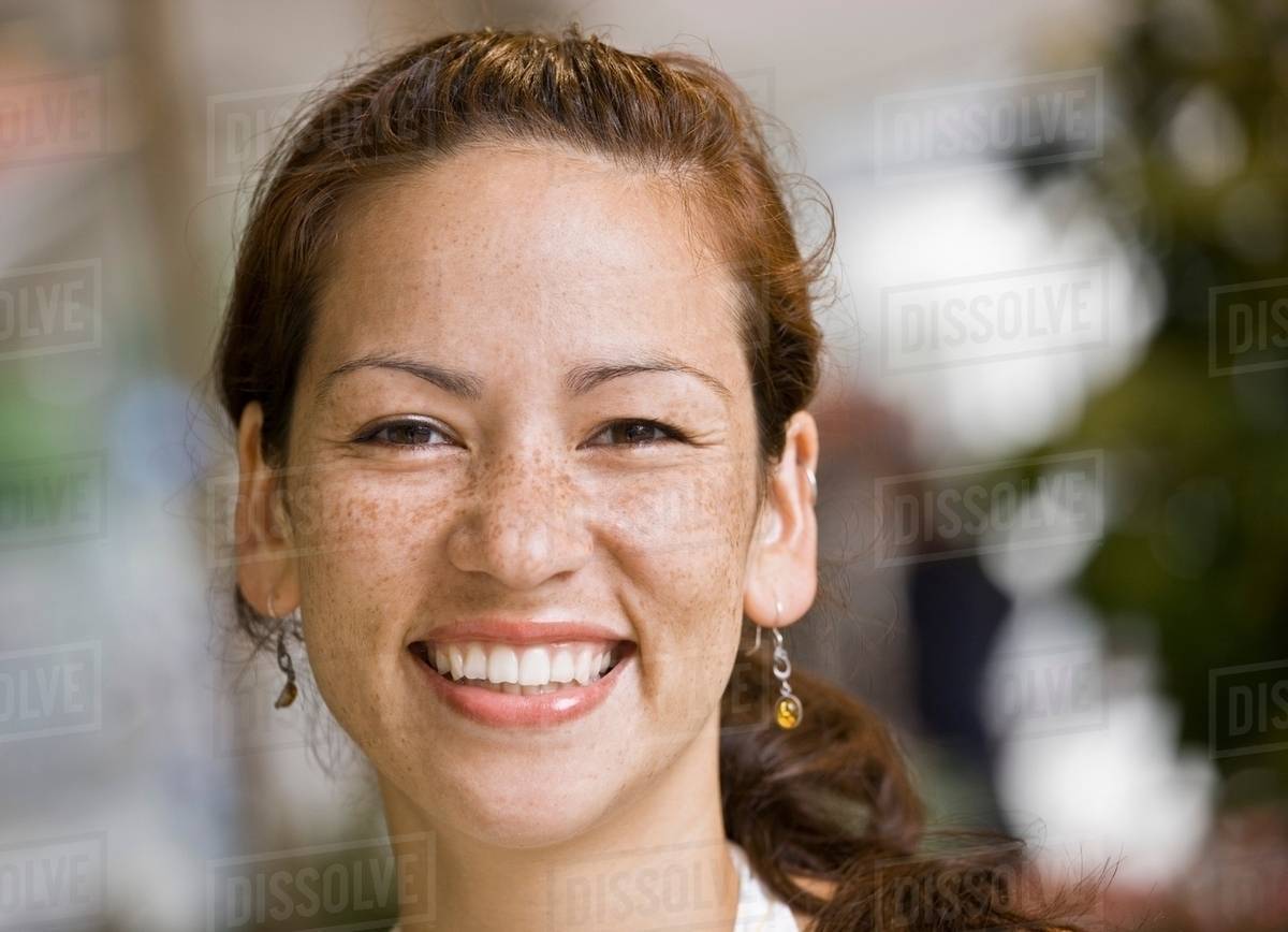 Portrait of a smiling woman - Stock Photo - Dissolve