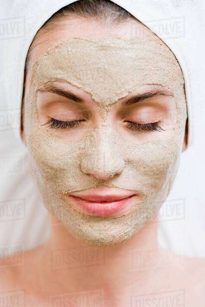 Woman with face mask - Stock Photo - Dissolve