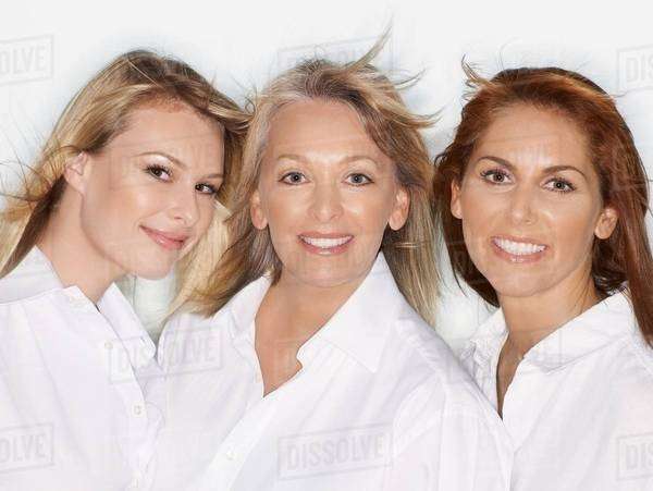 Group portrait of three women - Royalty-free Stock Photo | Dissolve