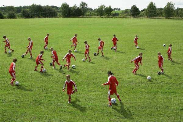 Young footballers training - Stock Photo - Dissolve