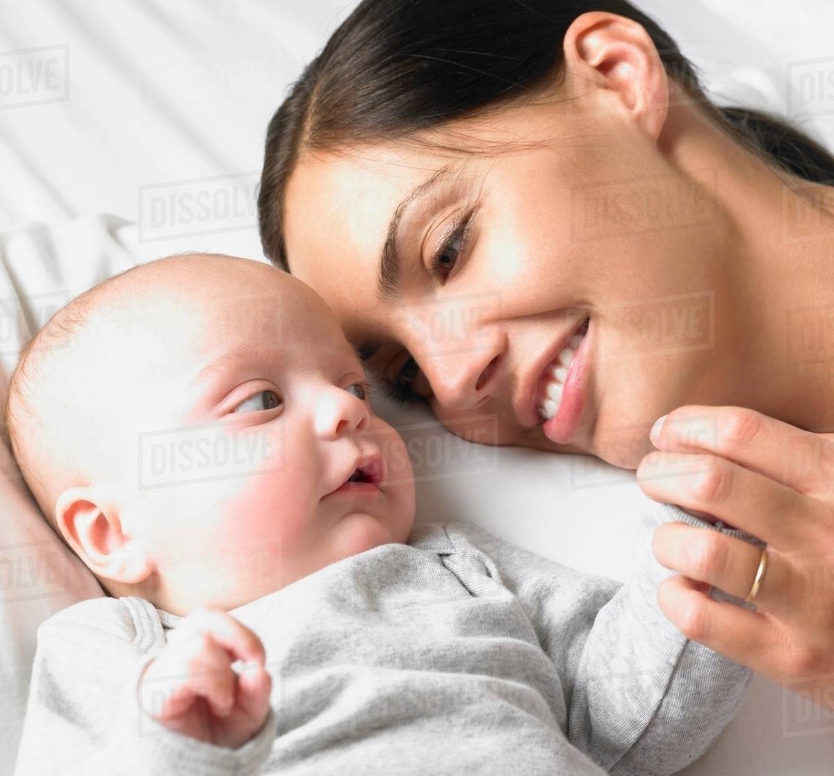 Mother with her baby-boy, smiling - Stock Photo - Dissolve