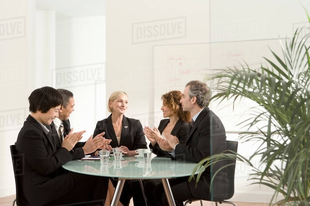 Applause in a business meeting - Stock Photo - Dissolve