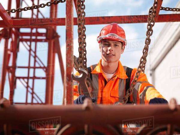 Crane Worker With Spanner - Stock Photo - Dissolve