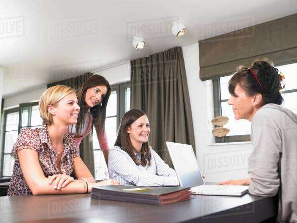 Women in a reunion at the office - Royalty-free Stock Photo | Dissolve