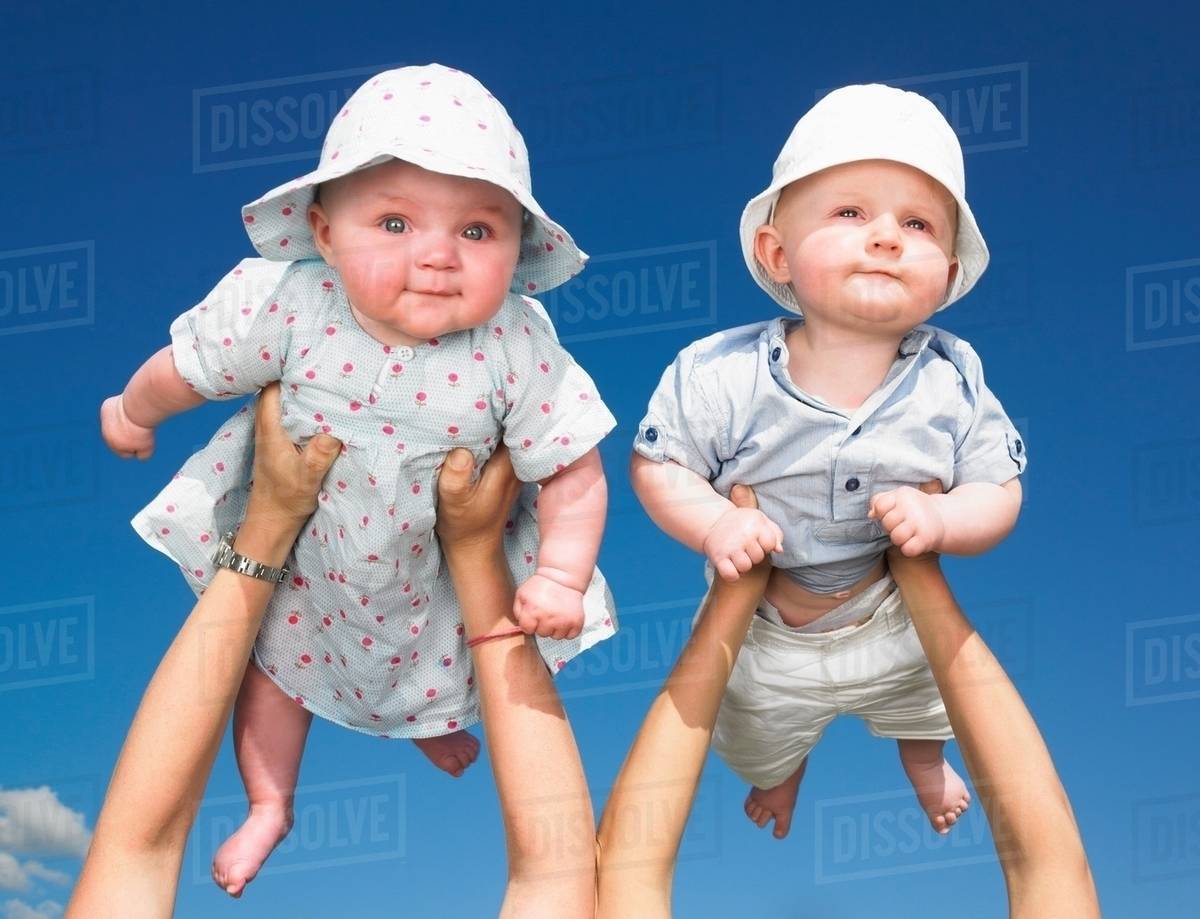 Babies up in the air - Royalty-free Stock Photo | Dissolve