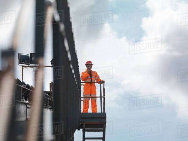 Coal Worker On Viewing Platform - Stock Photo - Dissolve