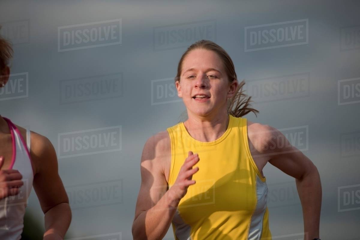 Female athlete competing - Royalty-free Stock Photo | Dissolve