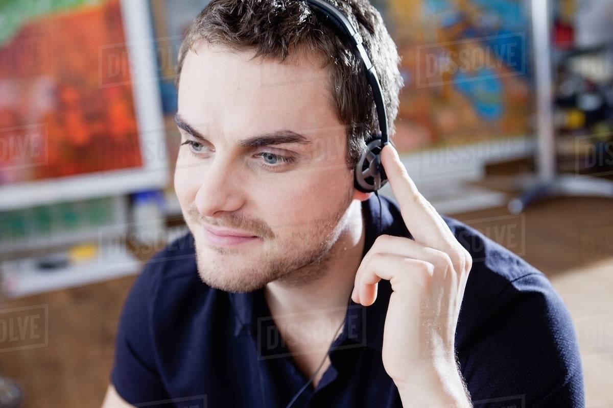 Man wearing headphones - Royalty-free Stock Photo | Dissolve