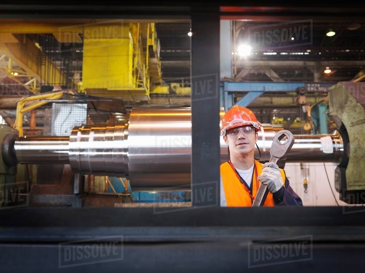 Engineer With Finished Steel Products - Stock Photo - Dissolve