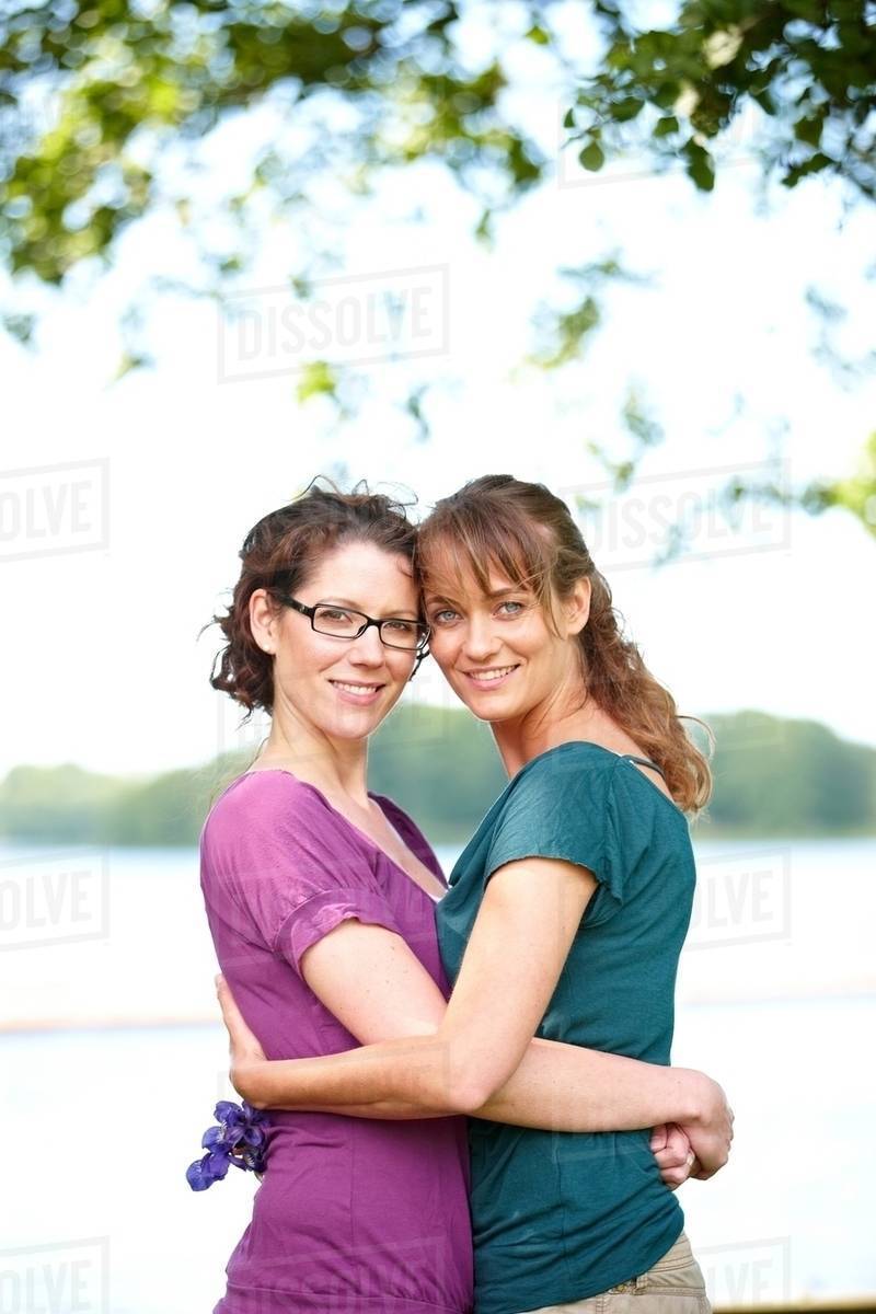 Two women in loving embrace - Royalty-free Stock Photo | Dissolve