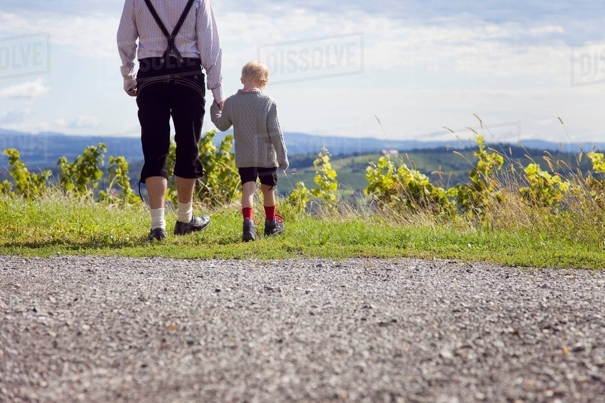Man and boy wandering in the foothills - Royalty-free Stock Photo ...