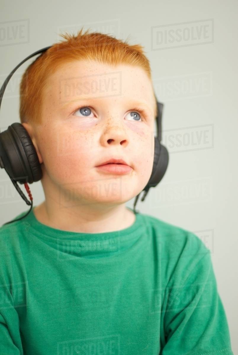 Boy with headphones on - Royalty-free Stock Photo | Dissolve