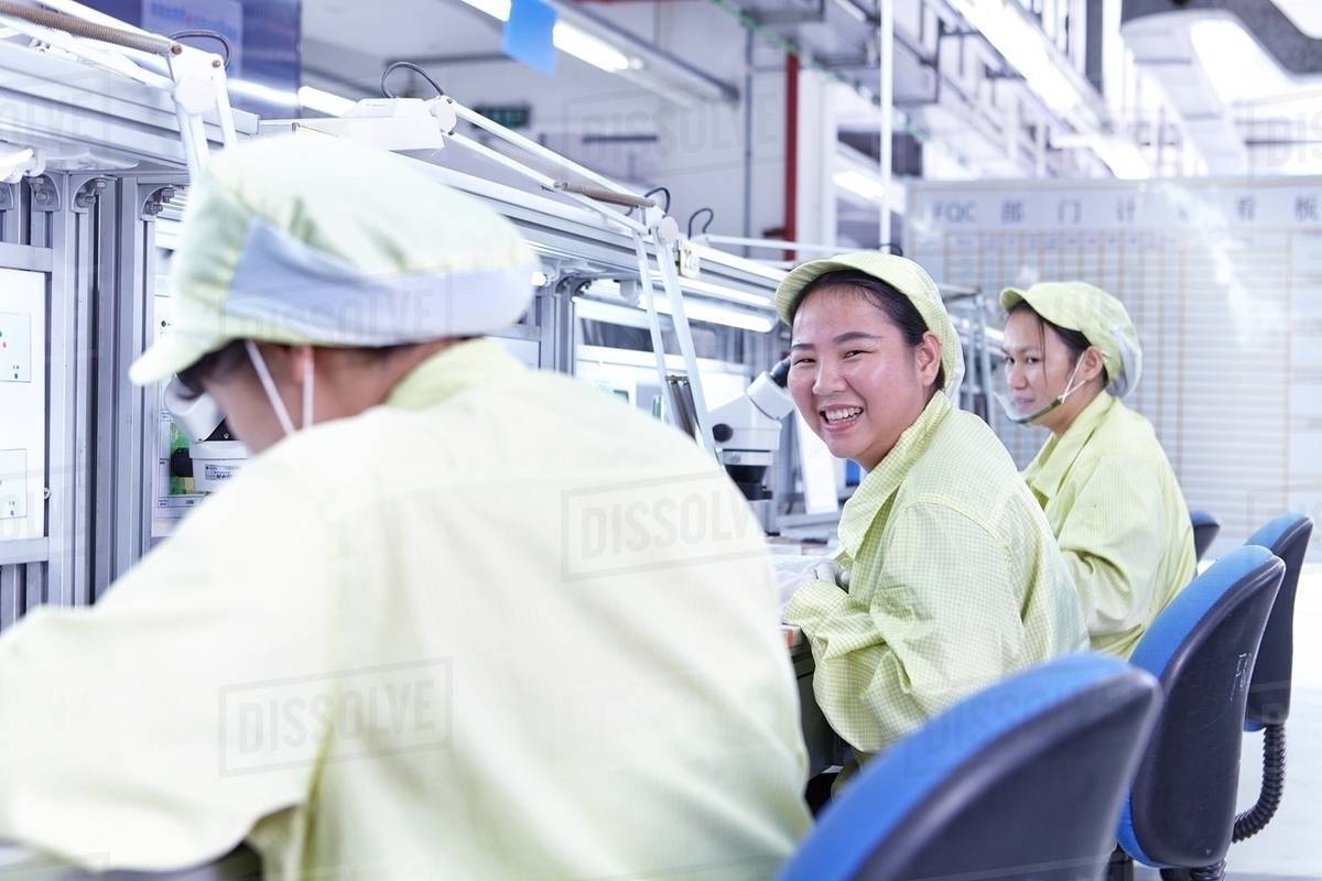 Quality check station at factory producing flexible electronic circuit ...