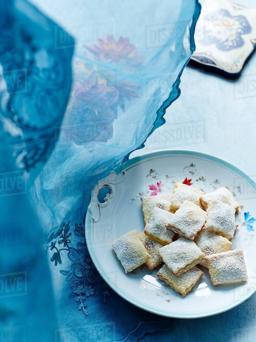Still life with plate of Italian strucchi - Stock Photo - Dissolve