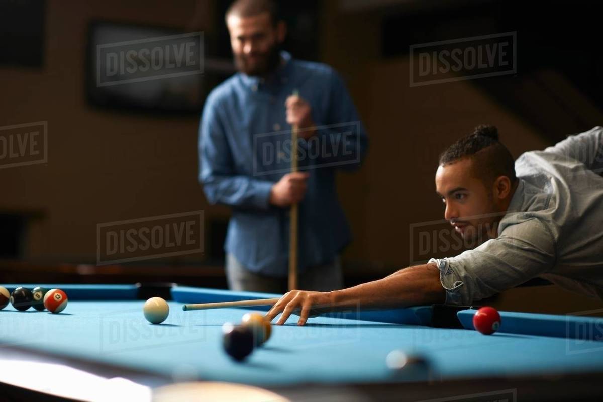 Man playing pool - Royalty-free Stock Photo | Dissolve