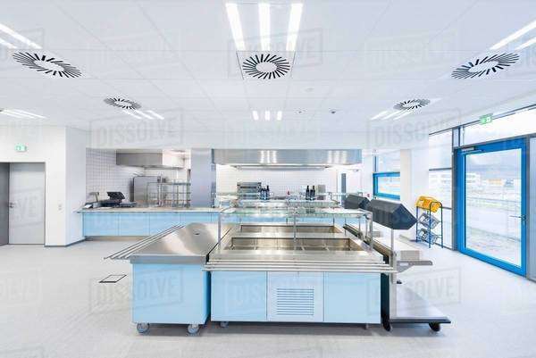 Empty factory canteen with serving counters - Stock Photo - Dissolve