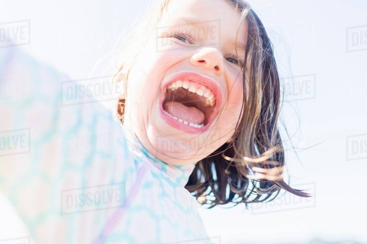 Happy and contented girl - Stock Photo - Dissolve