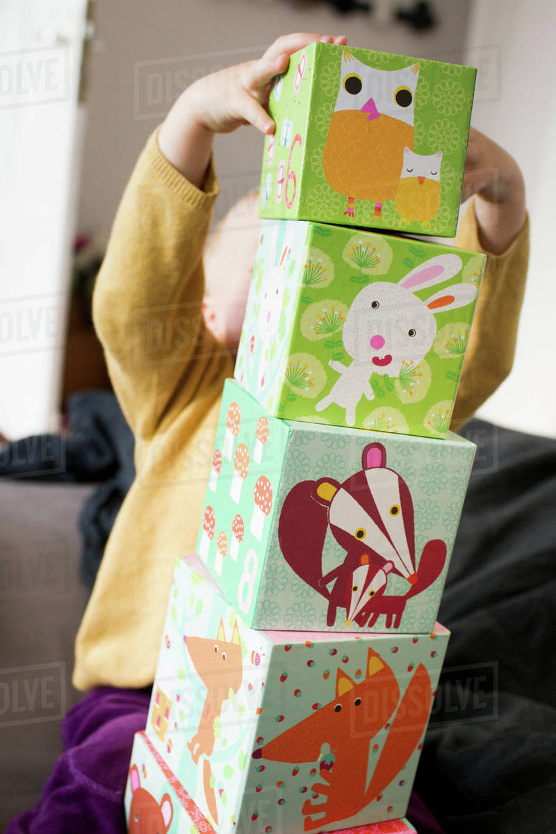 Baby girl building tower with building blocks - Royalty-free Stock ...