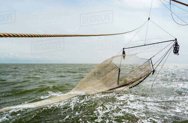 Seine fishing nets of fishing boat on ocean, Waddenzee, Friesland ...