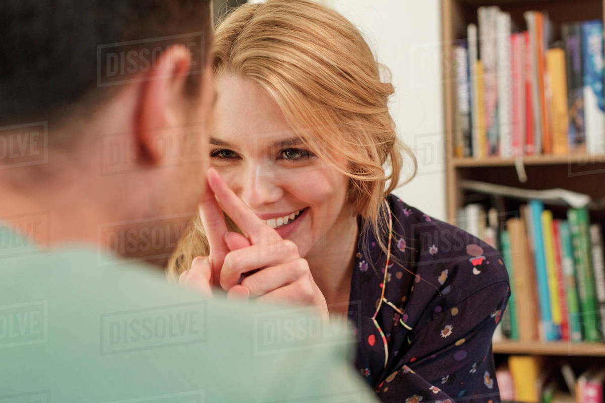 Couple face to face smiling - Royalty-free Stock Photo | Dissolve