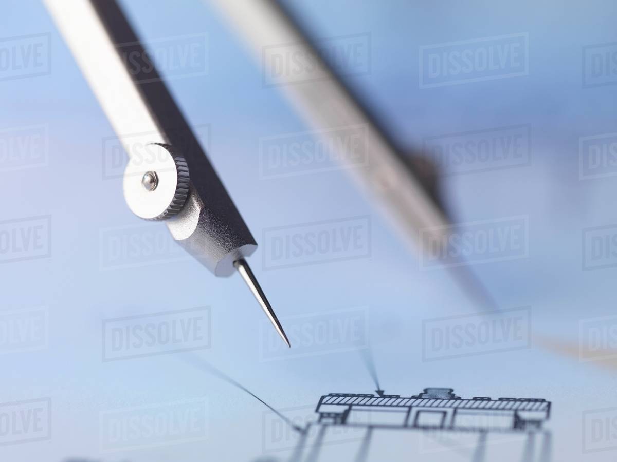 Dividers making a measurement on a engineering drawing - Royalty-free ...