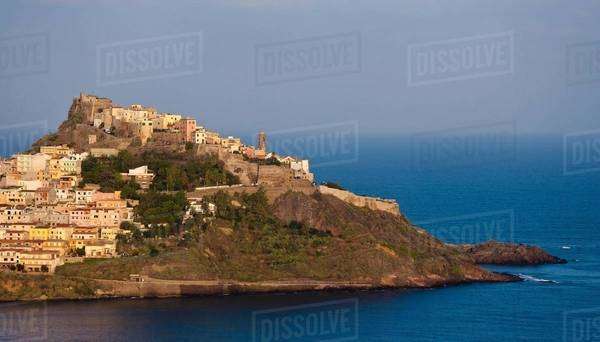 Aerial view of village on hillside - Stock Photo - Dissolve