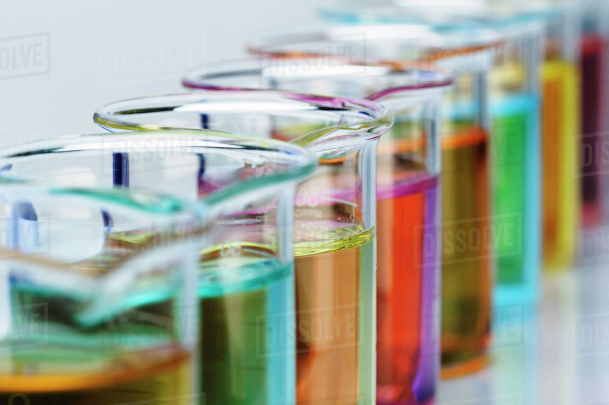 Beakers with solutions of transition metal salts - Stock Photo - Dissolve
