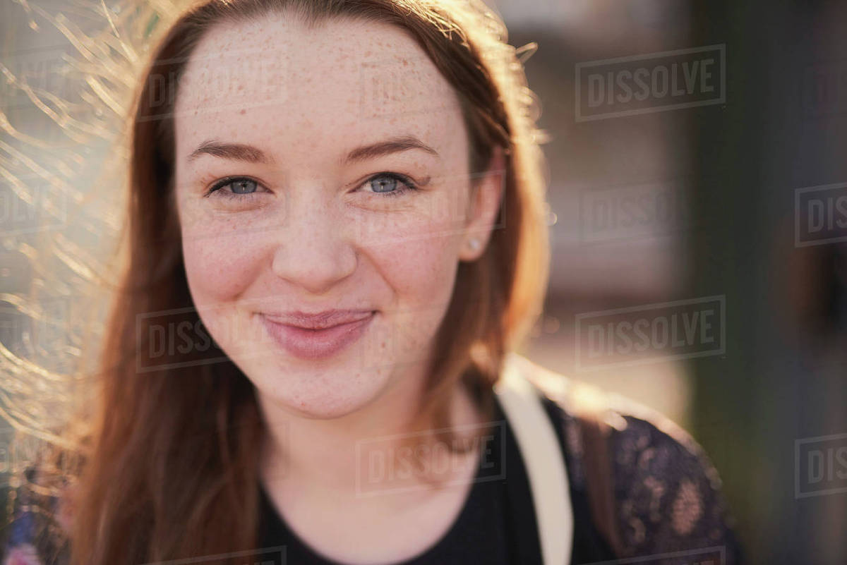 Portrait of young woman, outdoors, smiling, Bristol, UK - Royalty-free ...