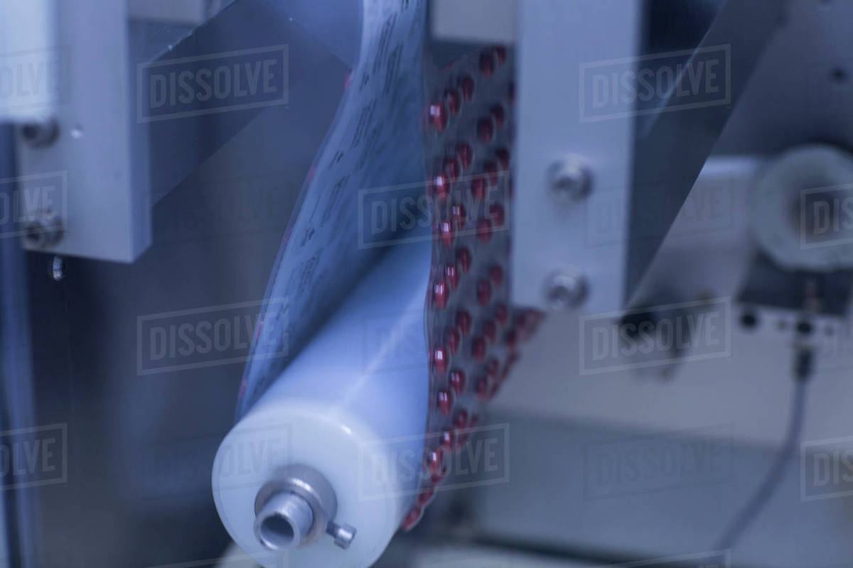 Tablet strip packing machine in pharmaceutical plant - Stock Photo ...