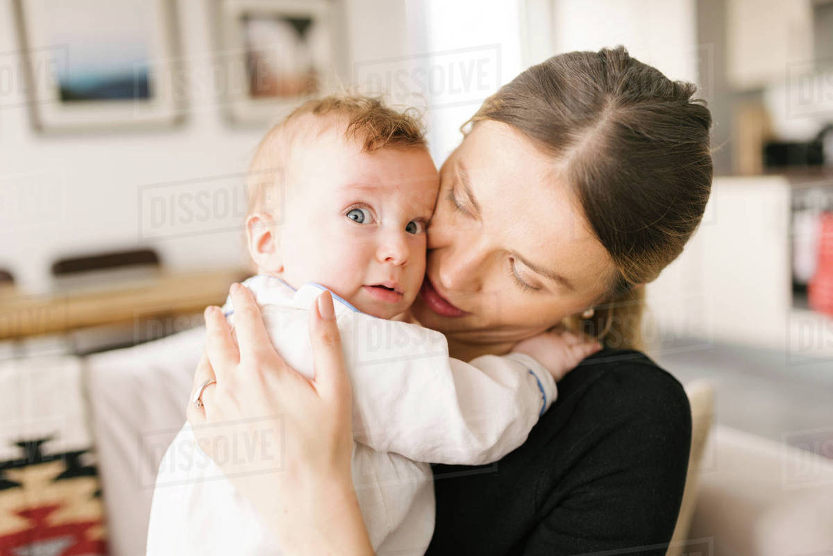 Mother and baby bonding at home - Royalty-free Stock Photo | Dissolve