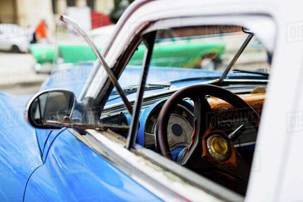 View through car window of vintage automobile interior, Habana, Cuba ...