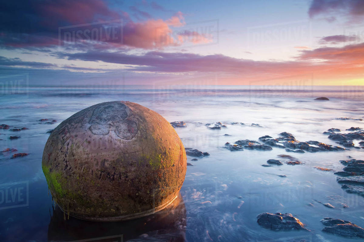 Graffiti on rock at beach - Royalty-free Stock Photo | Dissolve