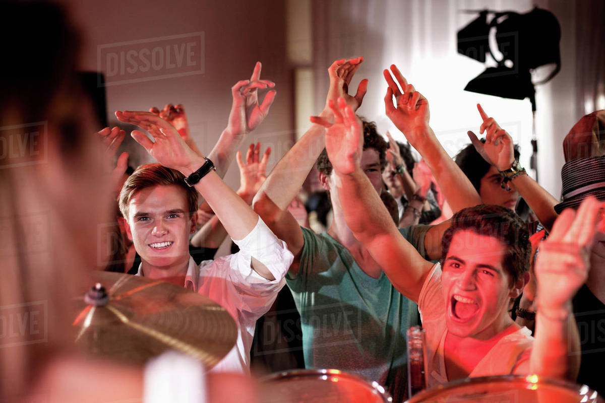 Teenage boys at rock concert - Royalty-free Stock Photo | Dissolve