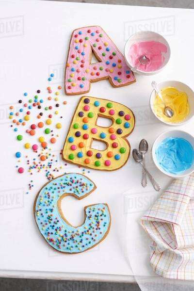 Decorated cookies in letter shapes - Stock Photo - Dissolve