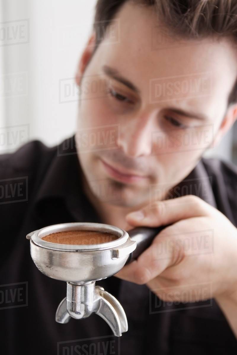 Barista using espresso machine - Royalty-free Stock Photo | Dissolve