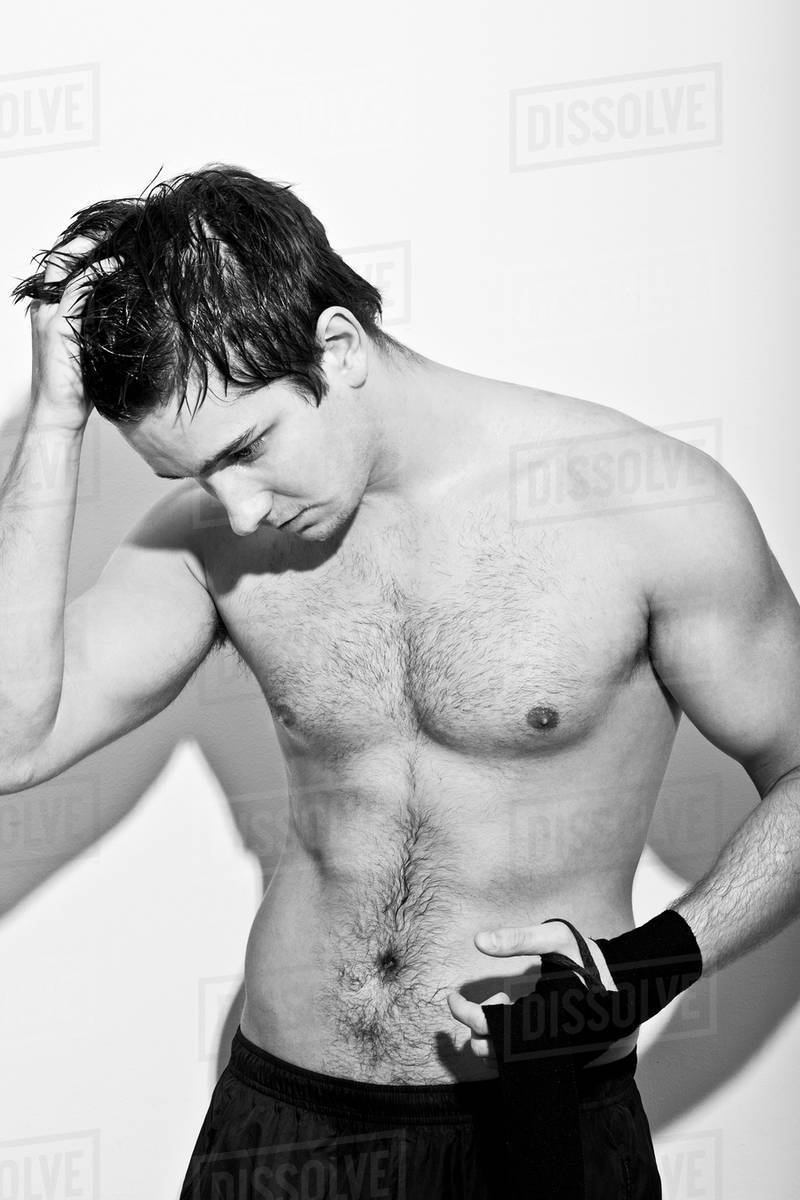 Boxer scratching his head - Royalty-free Stock Photo | Dissolve