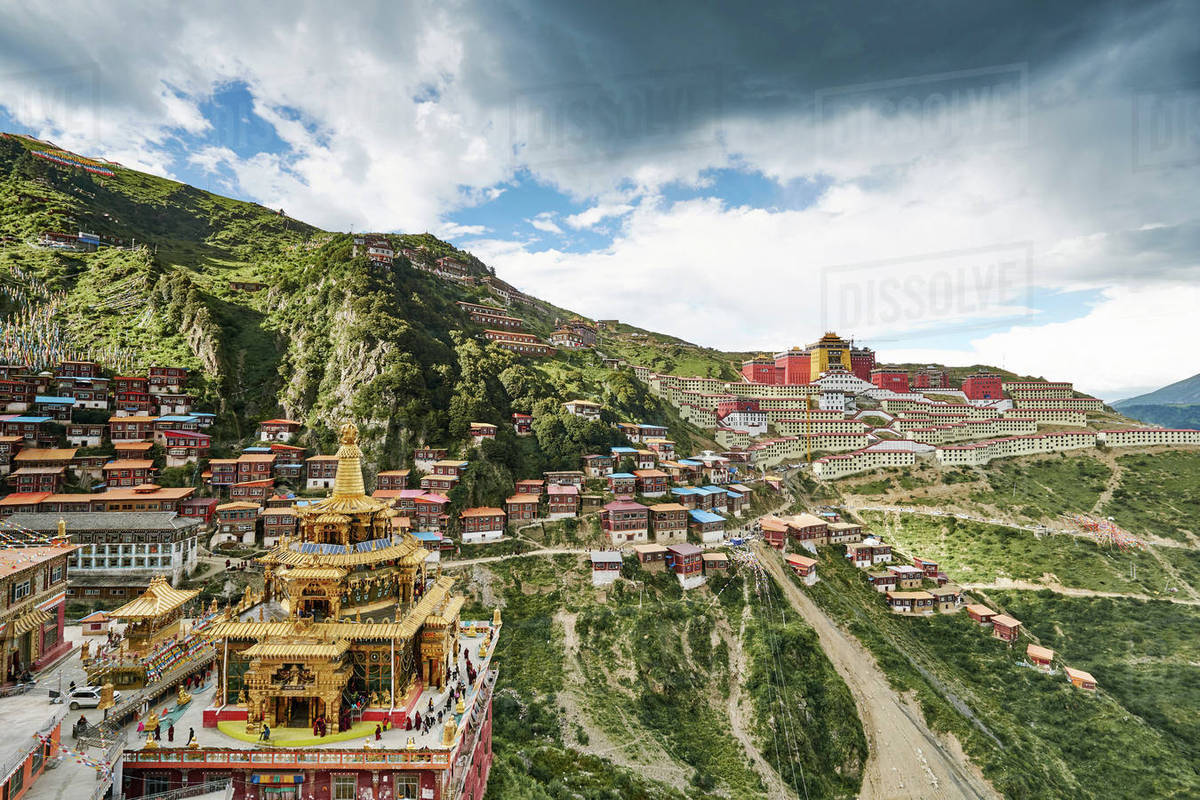 Katok Monastery on hillside, Baiyu, Sichuan, China - Stock Photo - Dissolve