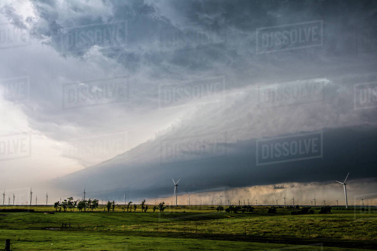 Supercell storm with shelf cloud over wind turbines, Oklahoma, USA ...