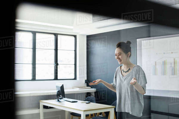 Lecturer delivering lesson in class - Royalty-free Stock Photo | Dissolve